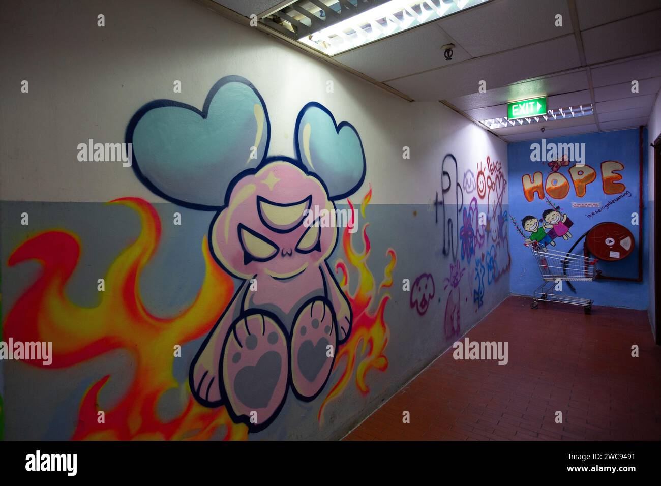 At the corner stretch inside a shopping mall, striking graffiti is ...