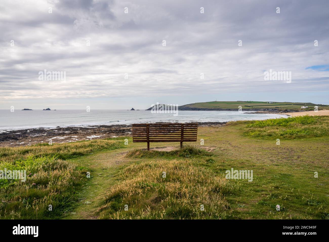 An old rusty bench in Treyarnon Bay, Cornwall, England, UK Stock Photo ...