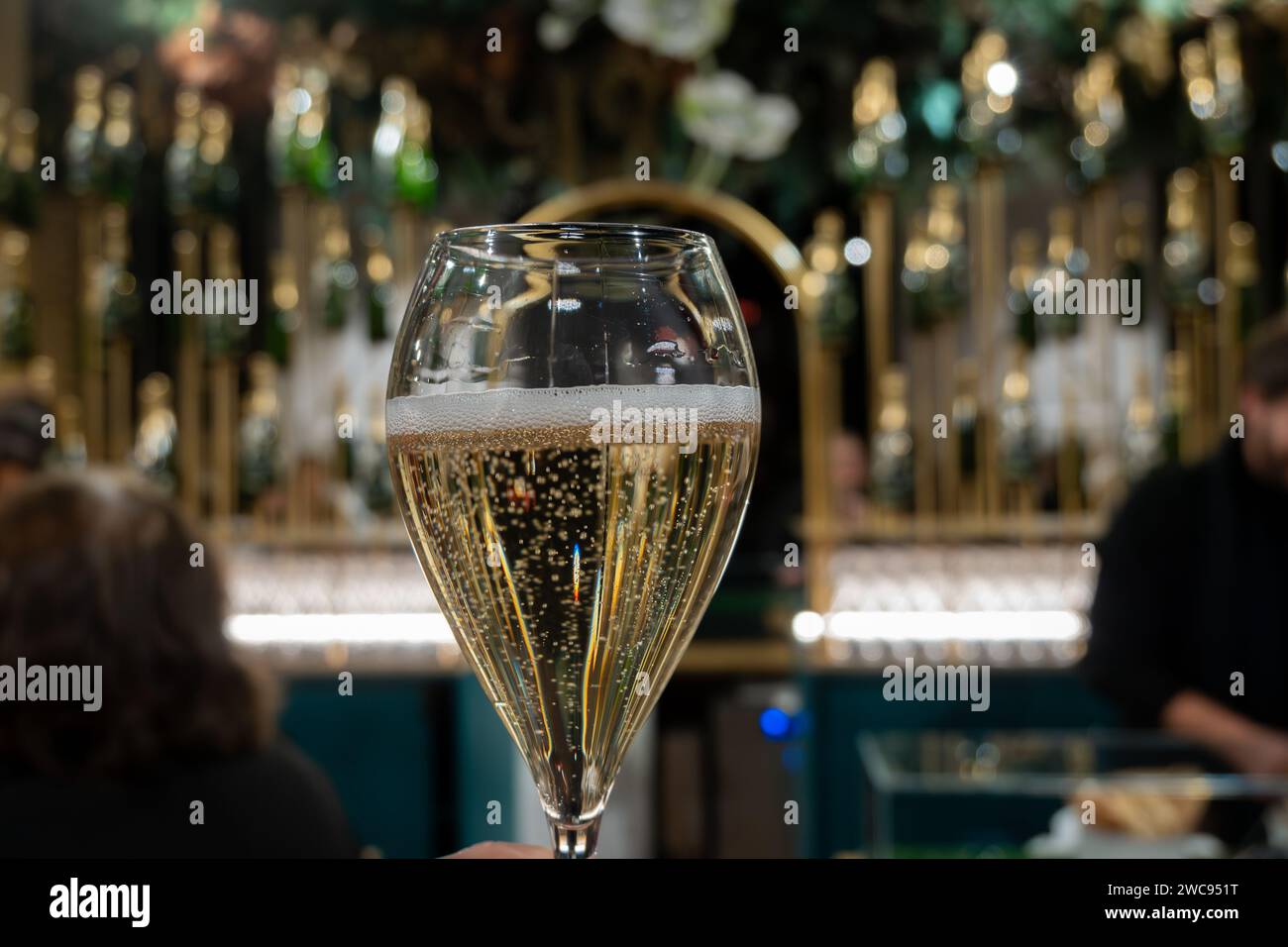 Glass with little bubbles, tasting of sparkling wine champagne on ...