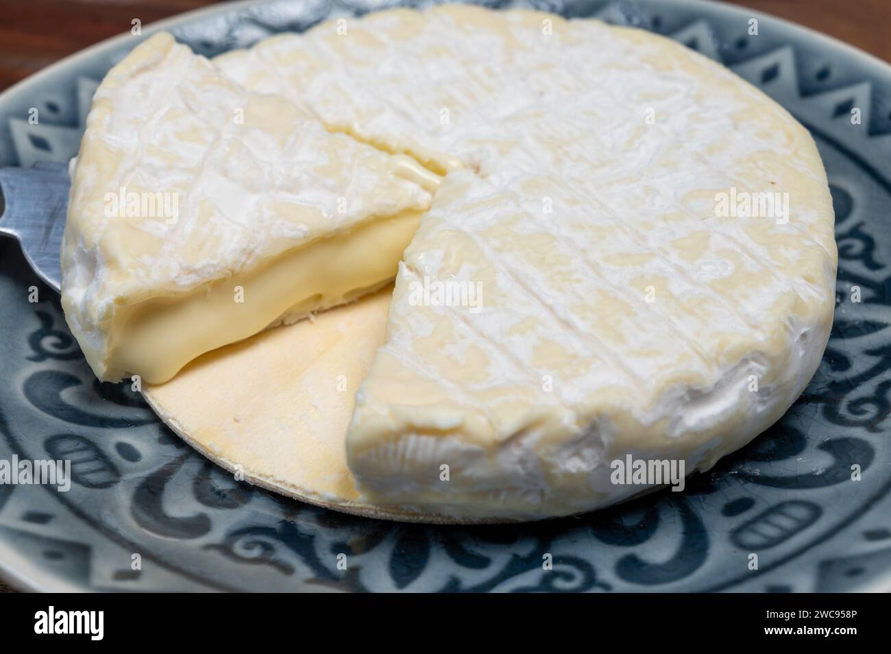 French soft Cremeux de Normandie cheese, soft creamy cheese with white ...