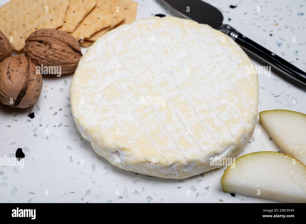 French soft Cremeux de Normandie cheese, soft creamy cheese with white ...