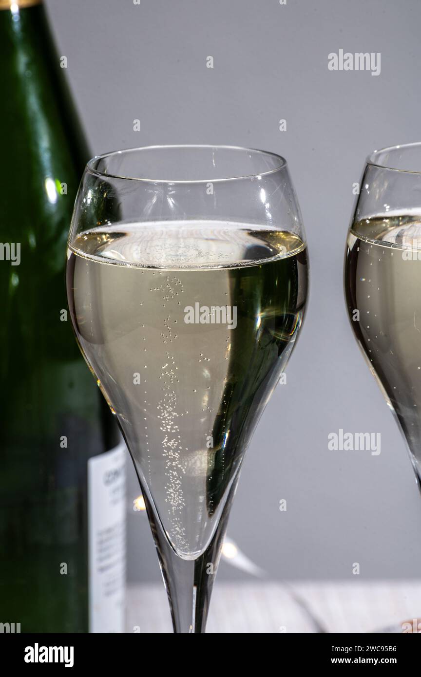 Glasses of bubble wine champagne, cremant, cava or prosecco and ...