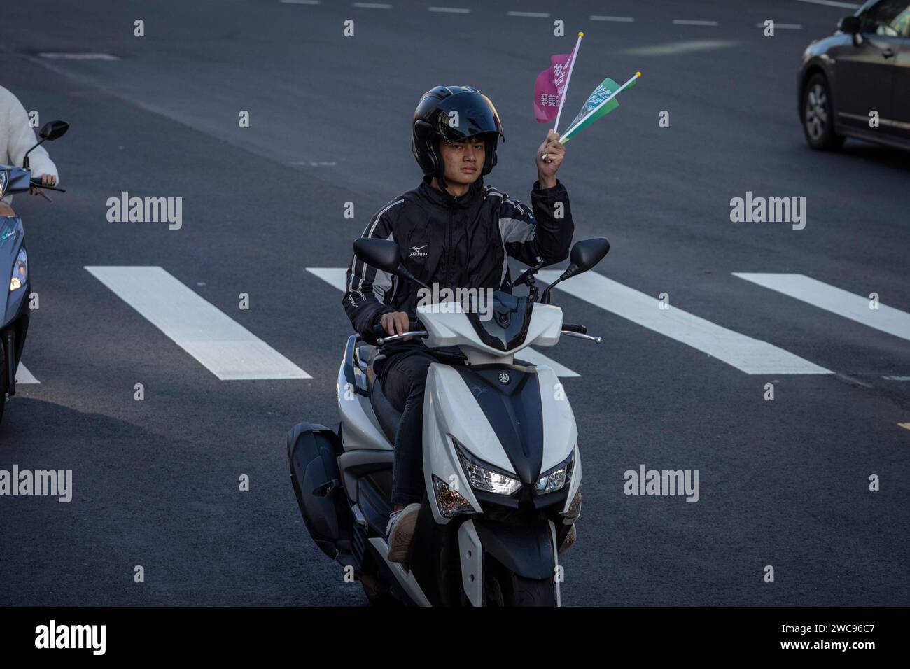Taipei, Taiwan. 12th Jan, 2024. A supporter was waving flag during ...