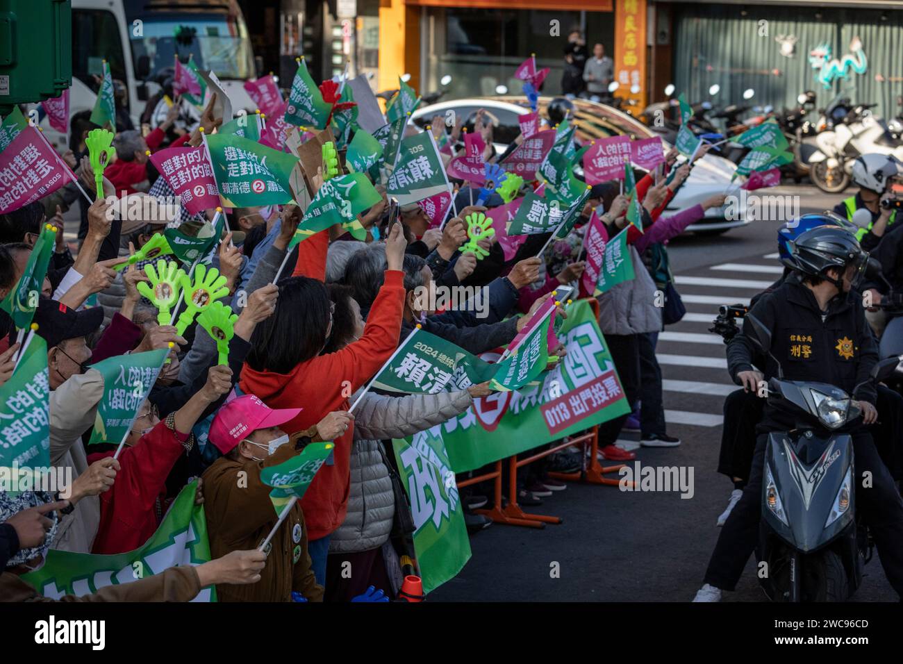 Taipei, Taiwan. 12th Jan, 2024. Supporters waved flags and cheered to ...