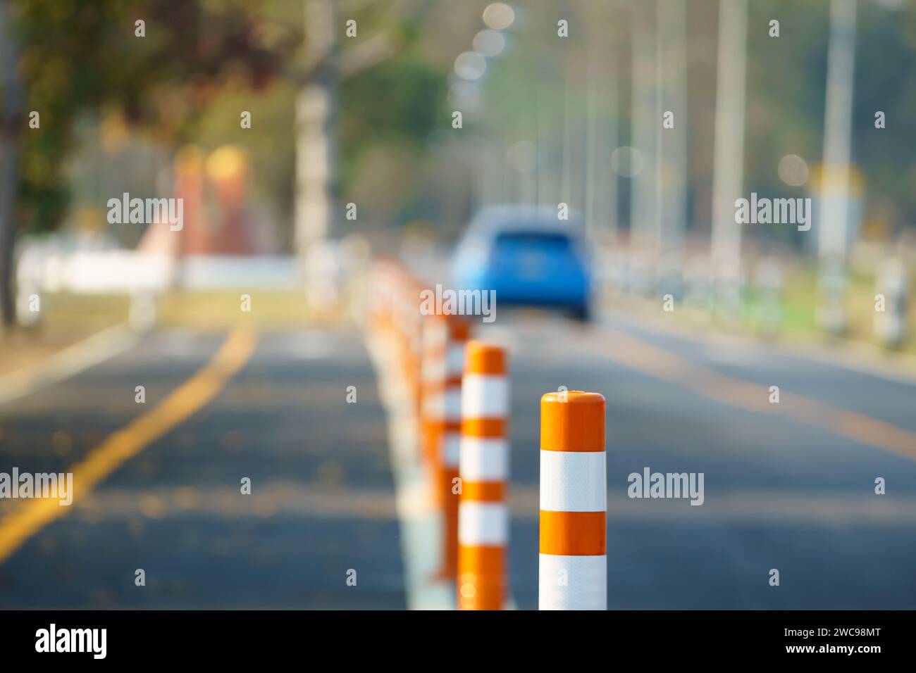 Flexible traffic bollard for bike lane Stock Photo - Alamy