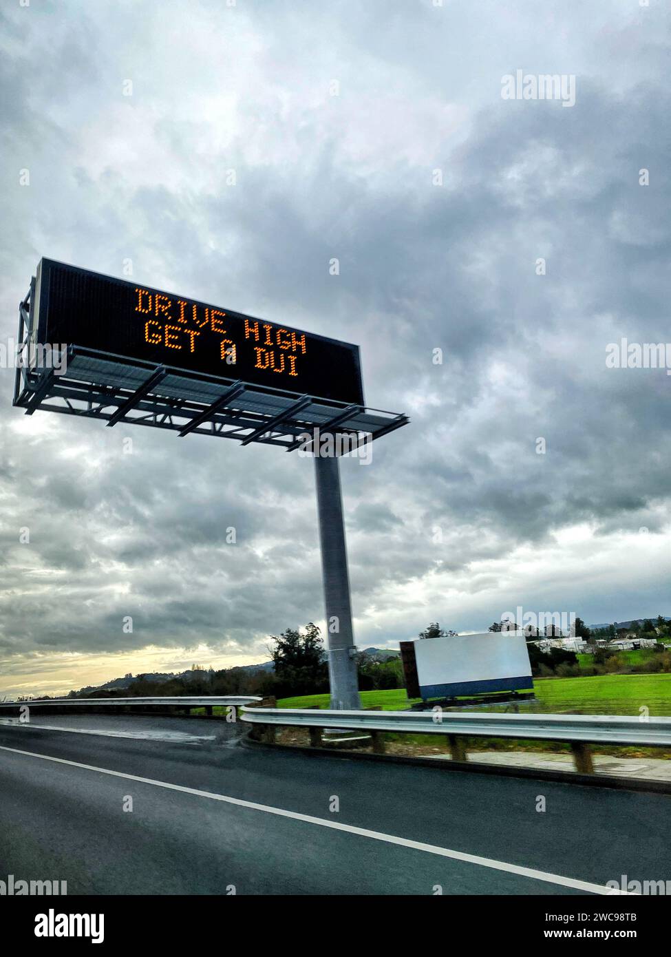 "Drive High, Get a DUI" electronic sign on a highway in California ...