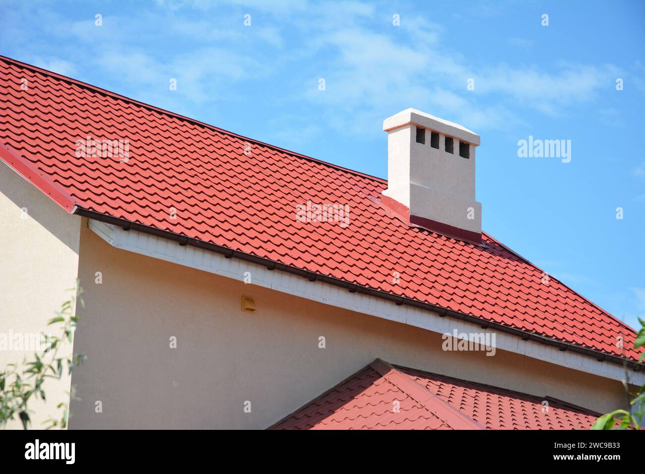 Red metal tile roof. Metal house red color rooftop with chimney Stock ...