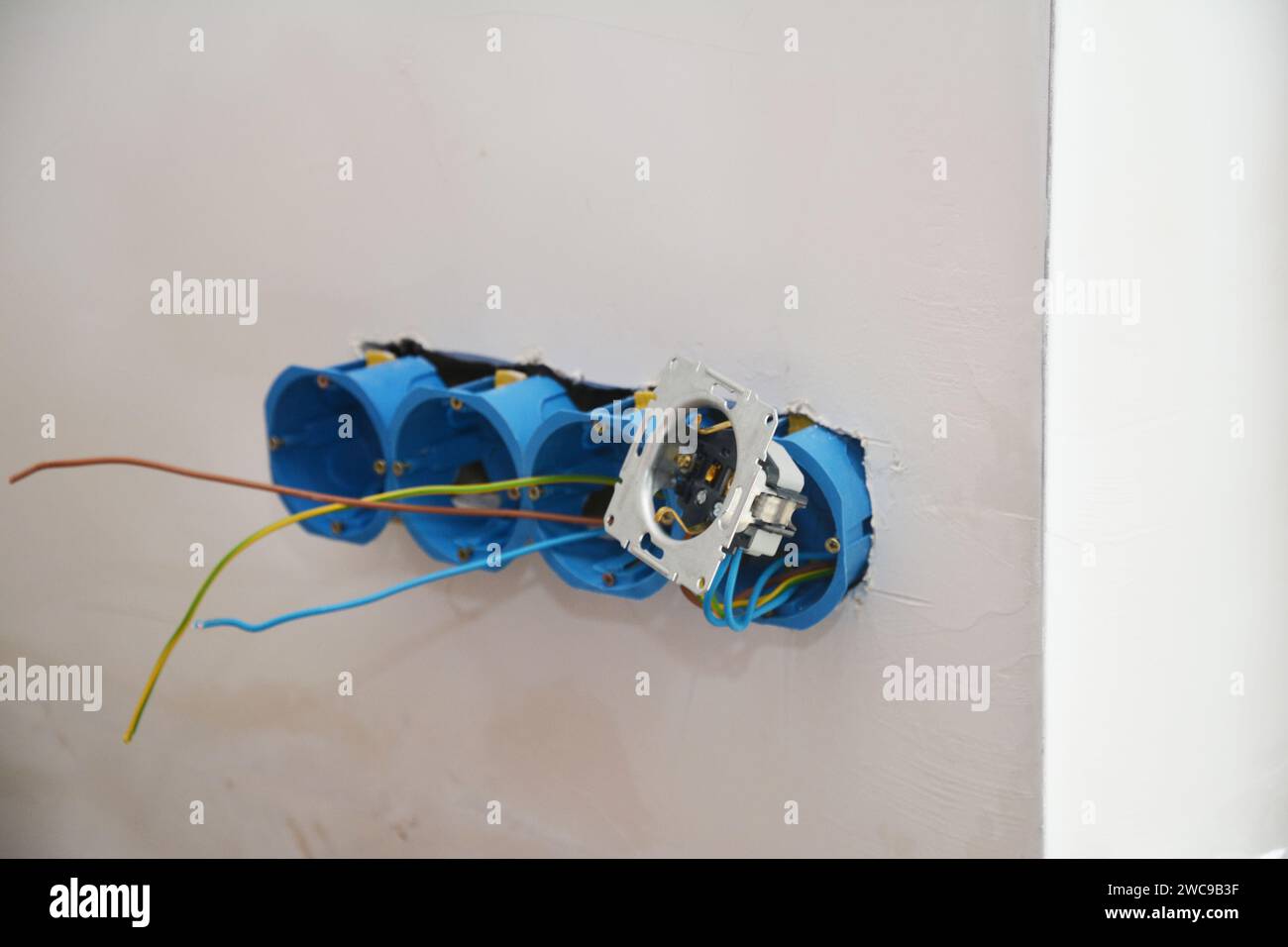 Installing a new electrical multi outlet socket receptacle, power ...