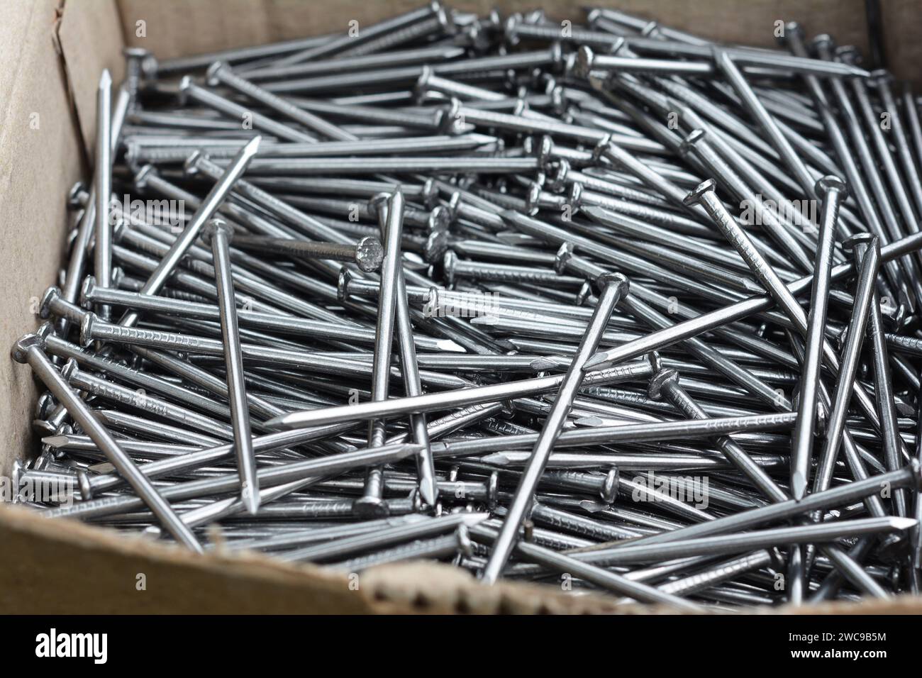 Metal nails in box hi-res stock photography and images - Alamy