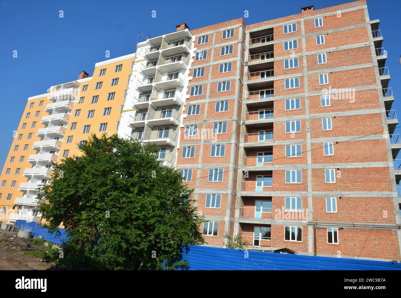 Photo of high-level brick wall building with wall insulation and ...