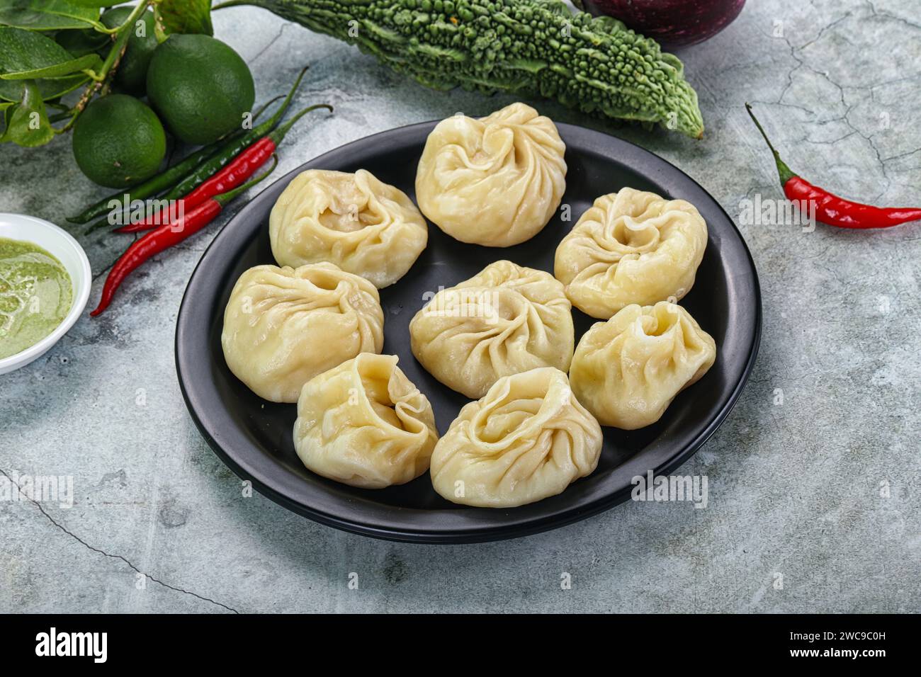 Nepali steamed dumplings Momo with mint sause Stock Photo - Alamy