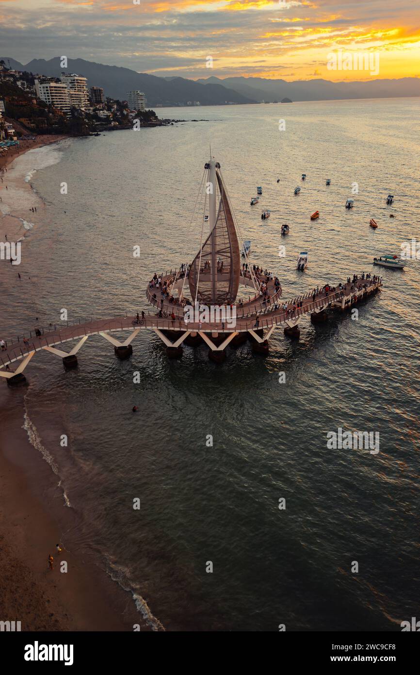 Closer aerial view vertical shot of Los Muertos Beach Pier in Puerto ...