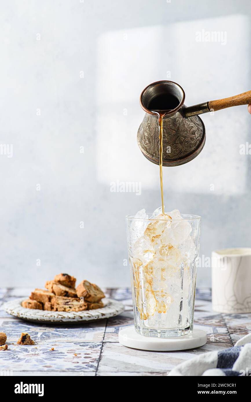 Ice coffee pouring milk cream hi-res stock photography and images - Alamy