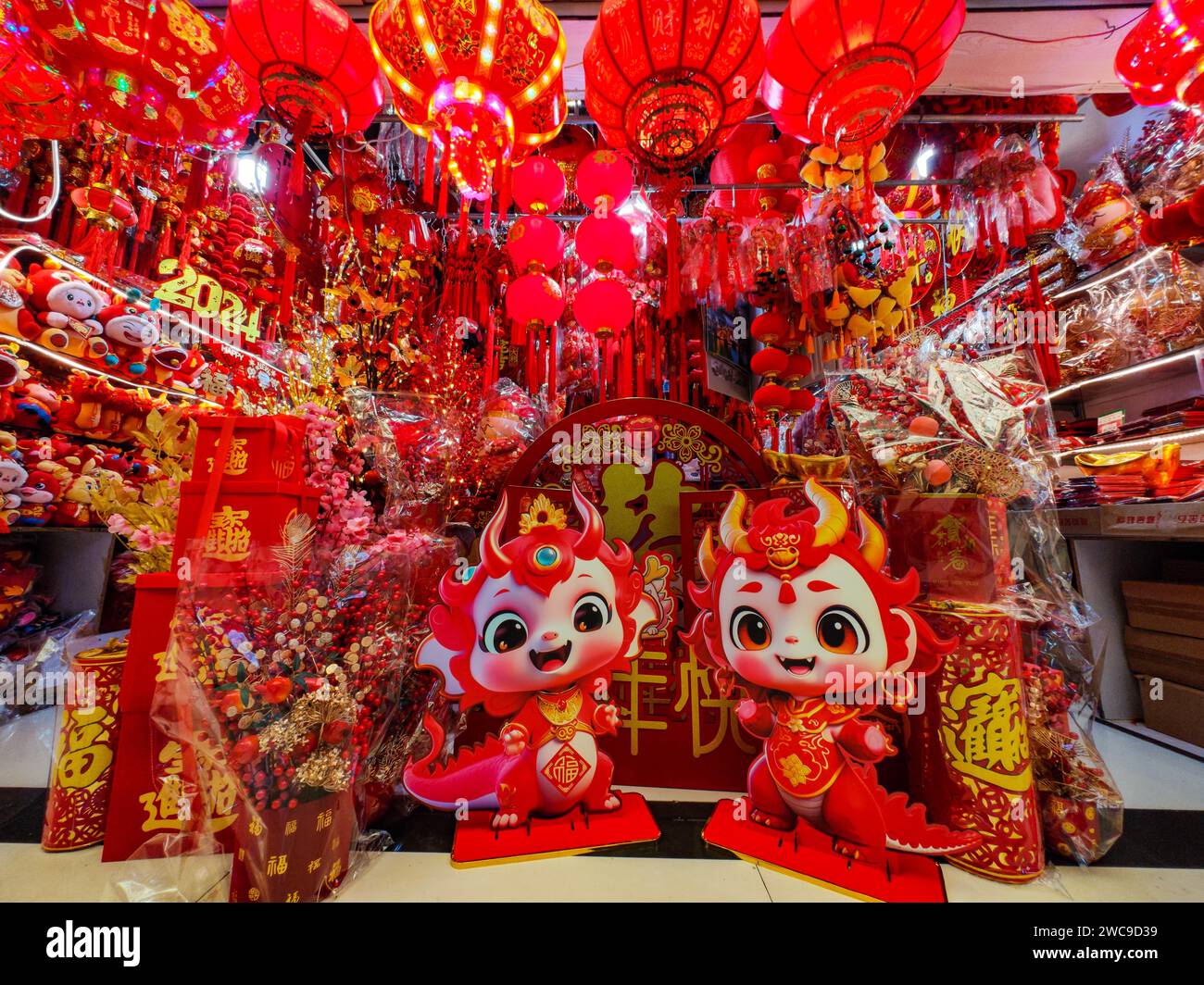 People shop Spring Festival decorations at a market in Hangzhou City ...