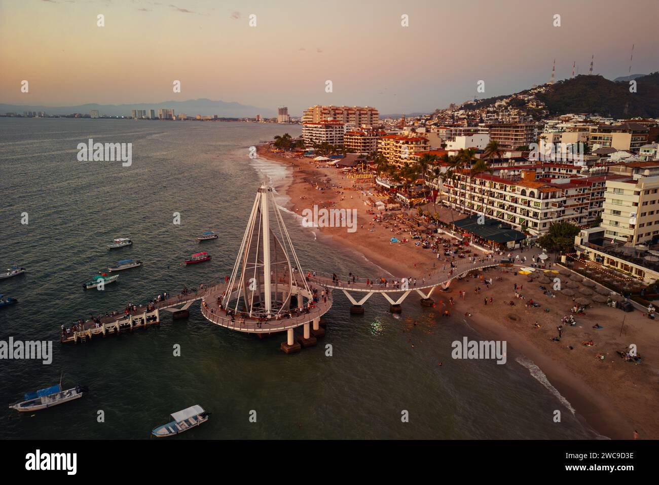 Horizontal image of Los Muertos Beach Pier looking towards Puerto ...