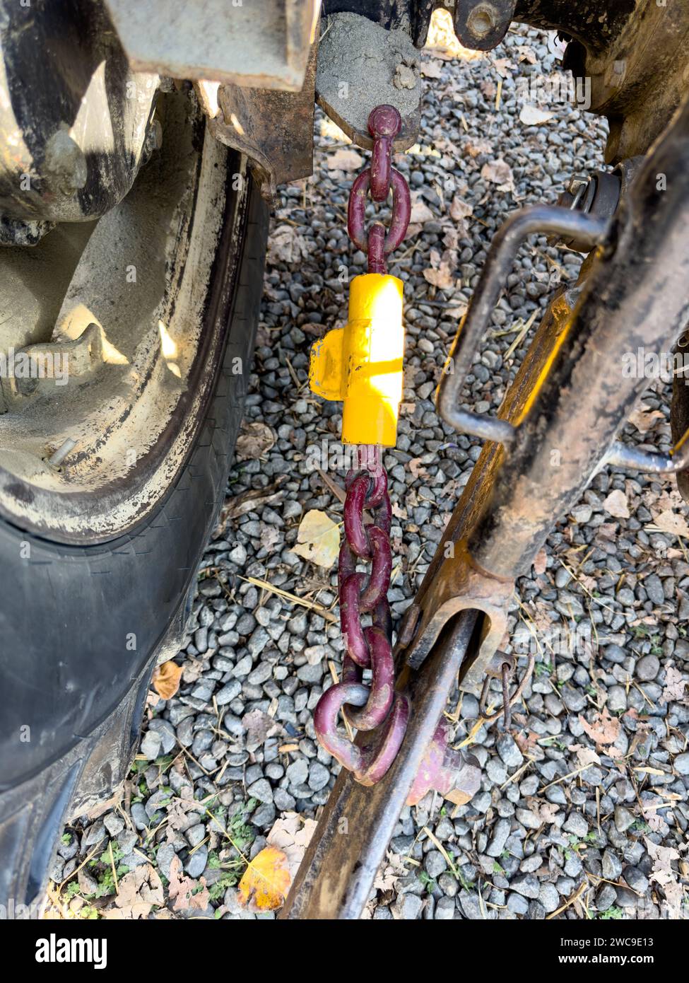 Tractor chain stabilizer attached to the rear of a tractor Stock Photo ...