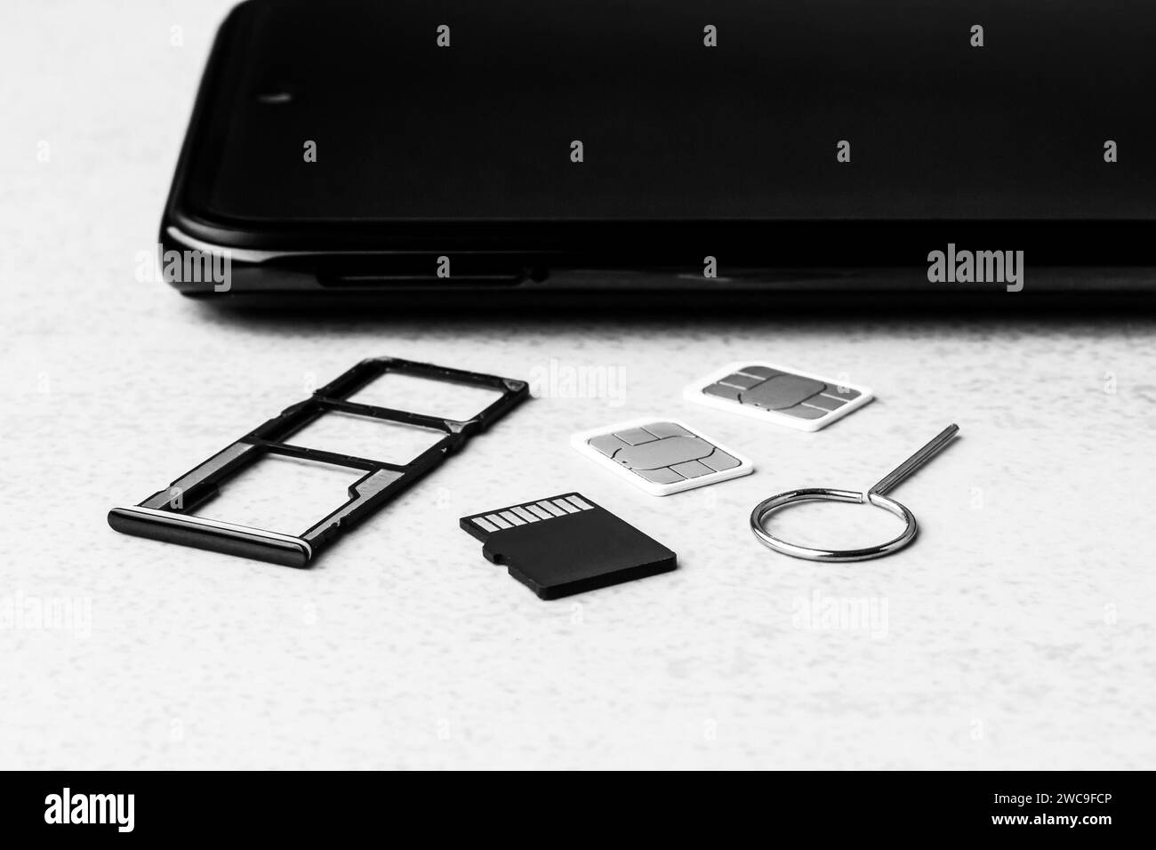 Two sim Black and White Stock Photos & Images - Alamy