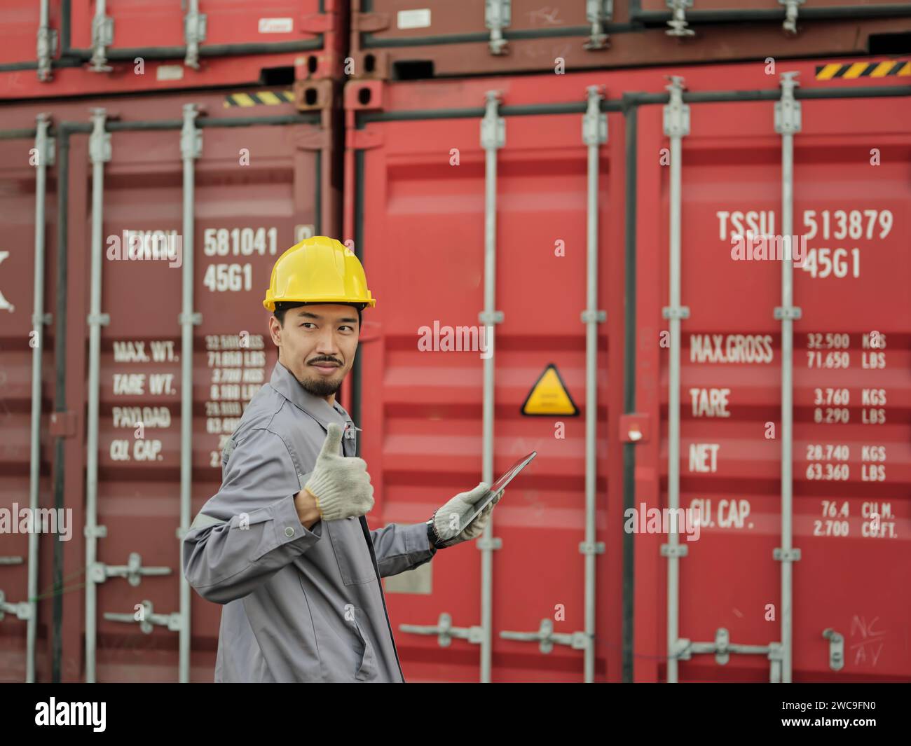 Portrait of Asian male worker wearing safety helmet working in ...