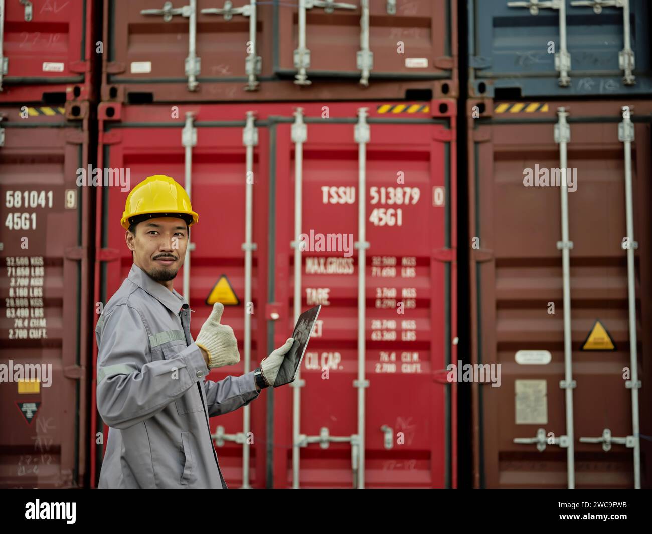 Portrait of Asian male worker wearing safety helmet working in ...