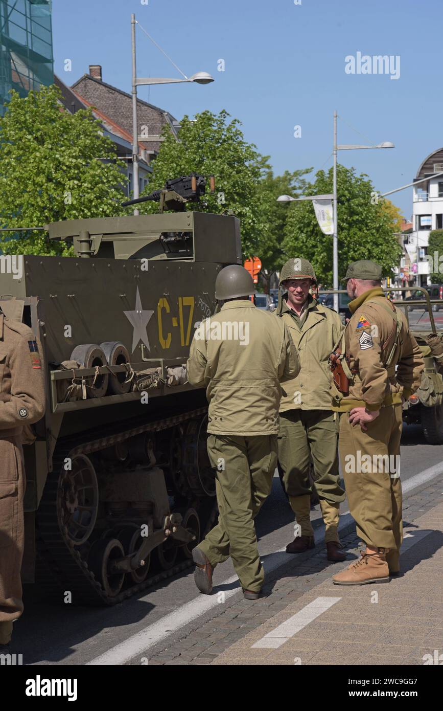 Reenactors of American Army forces from WW2 with vehicles at the ...