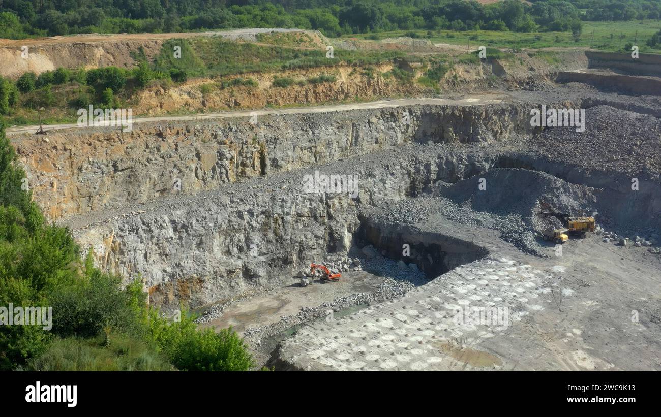 Extraction of granite. Open cast mine. Stone Quarrying. Granite quarry ...