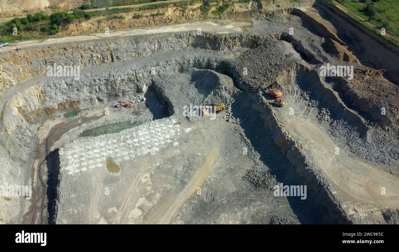 Extraction of granite. Open cast mine. Stone Quarrying. Granite quarry ...
