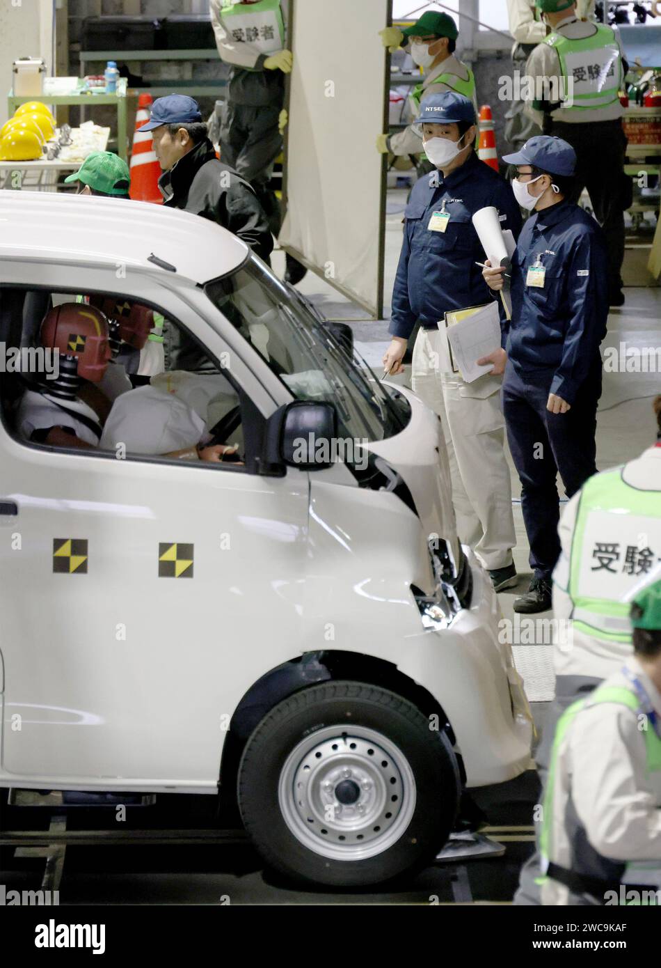 Technicians of Daihatsu Motor conduct front collision tests in the ...