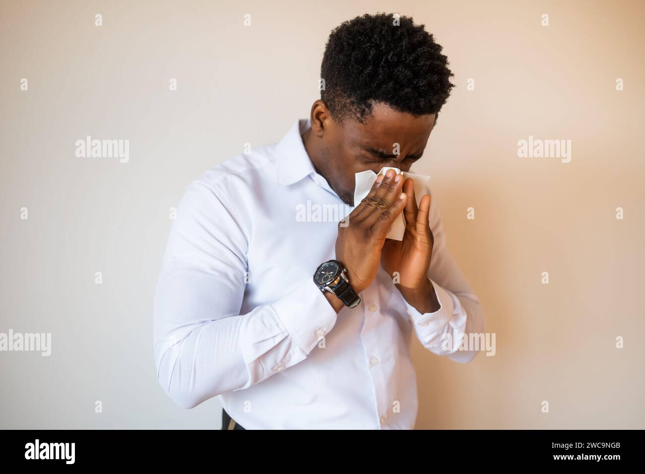 Businessman blowing his nose hi-res stock photography and images - Alamy