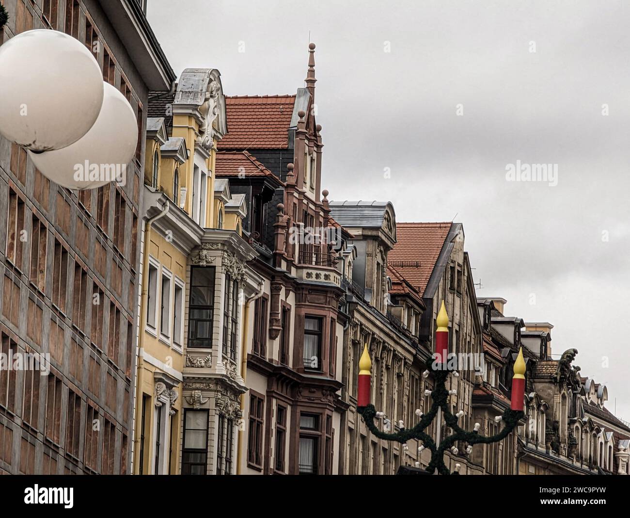 An urban street scene in Leipzig featuring historical buildings ...