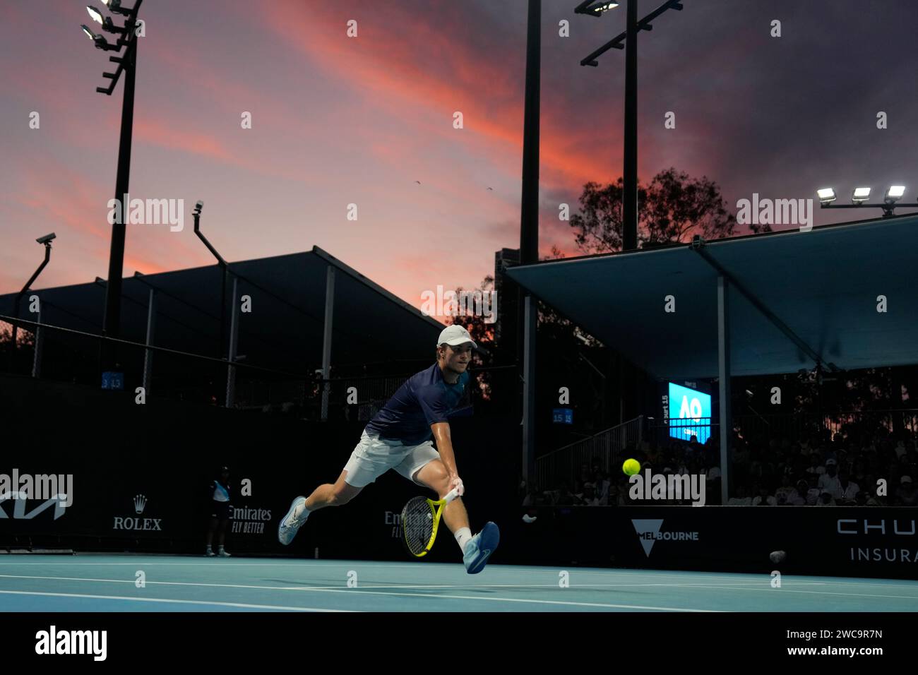 Miomir Kecmanovic of Serbia plays a forehand return to Yosuke Watanuki of Japan during their ...