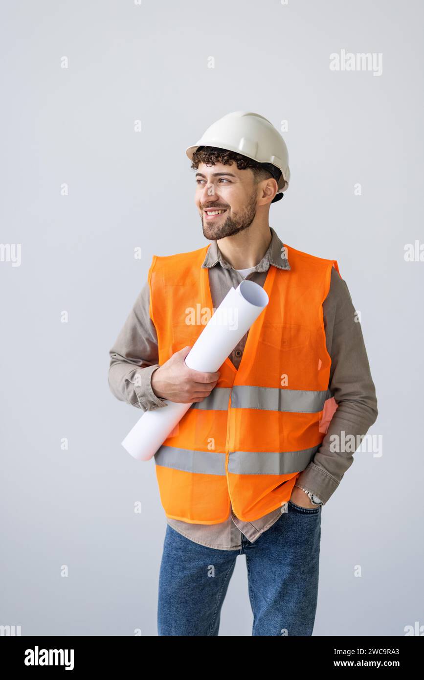 Portait of engineer with white hat blueprint isolated on white ...