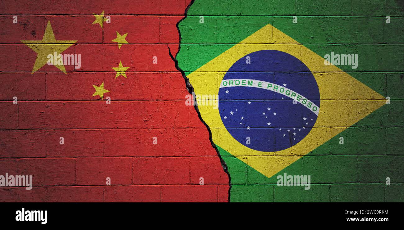 Cracked brick wall painted with an Chinese flag on the left and an ...