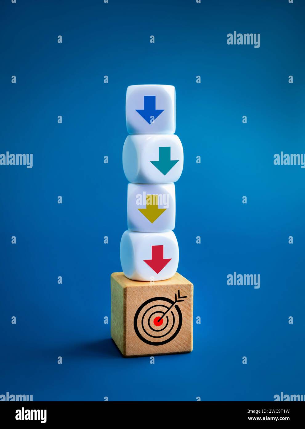 Multi colors down arrows on white block stack soaring down on target ...