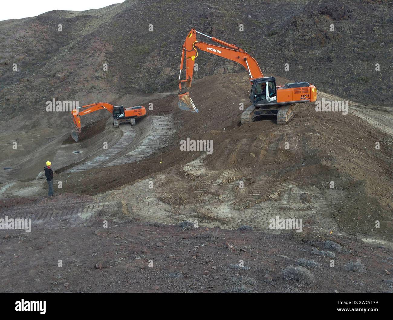 hitachi excavator at a construction site, heavy machinery for ...
