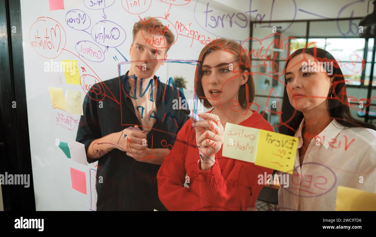 Young creative start up business team brainstorming idea and solving ...