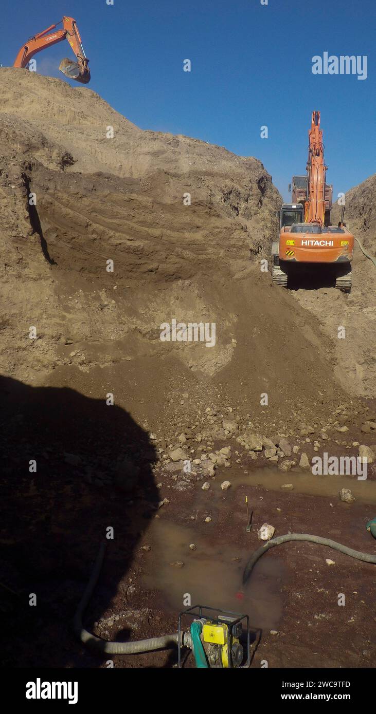hitachi excavator at a construction site, heavy machinery for ...