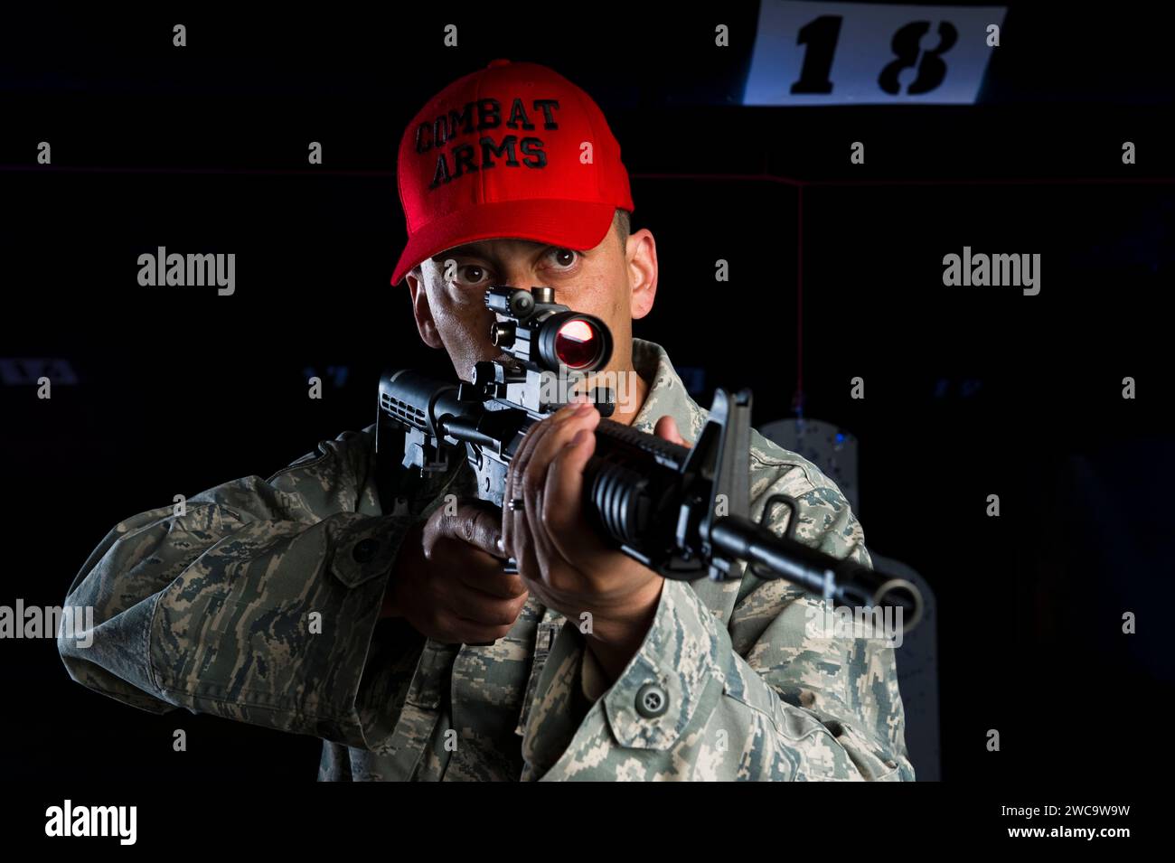 A military police officer stands at the shooting range with his rifle ...