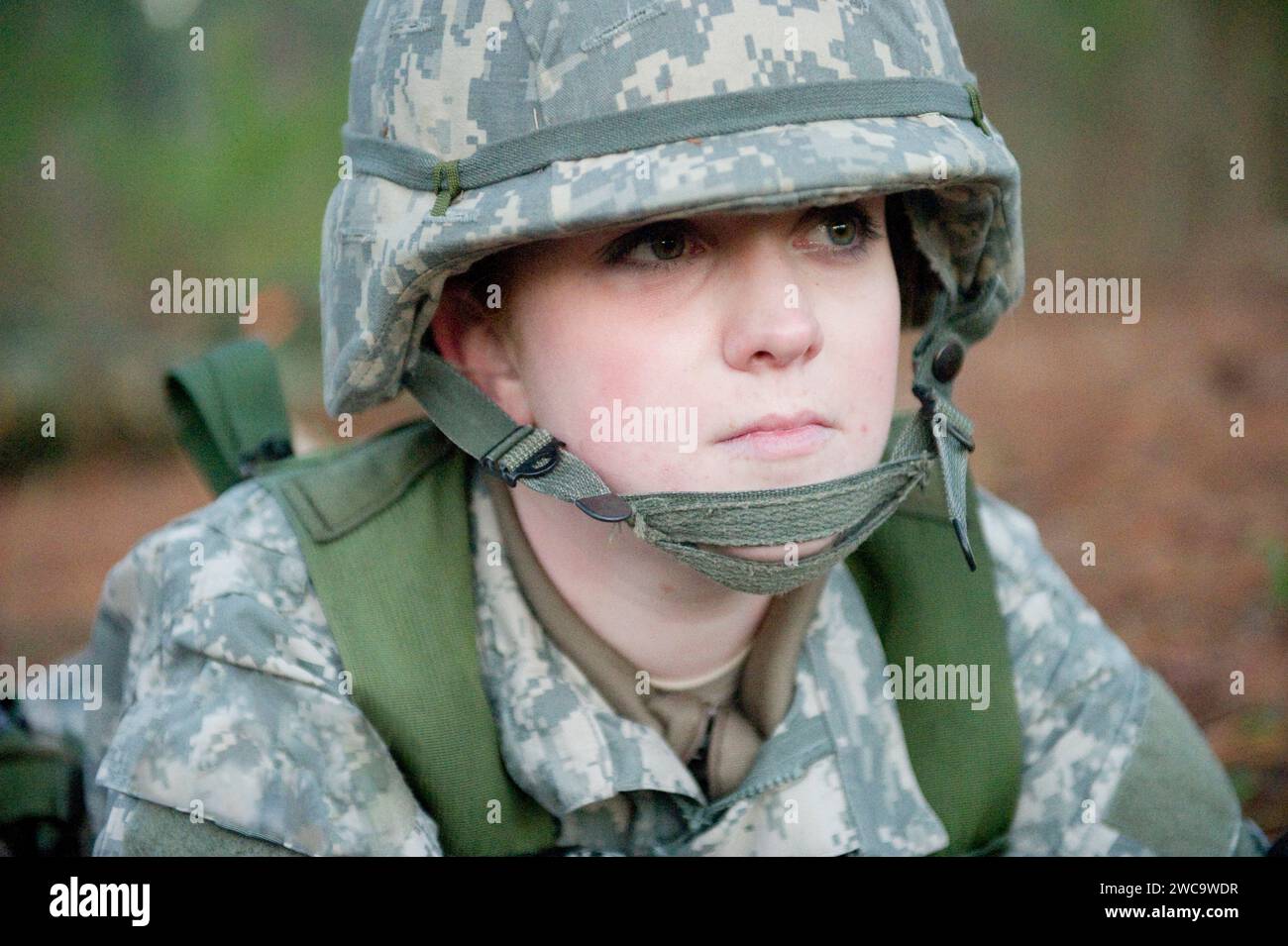 A female soldier provides formation security during a field training ...