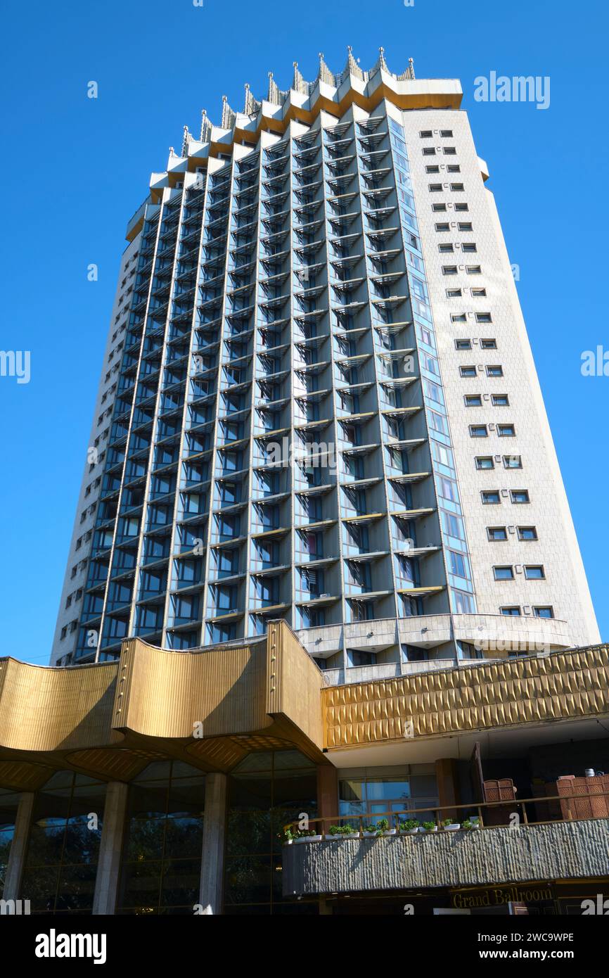 A view of the iconic, 26 floor Hotel Kazakhstan with front gold canopy ...