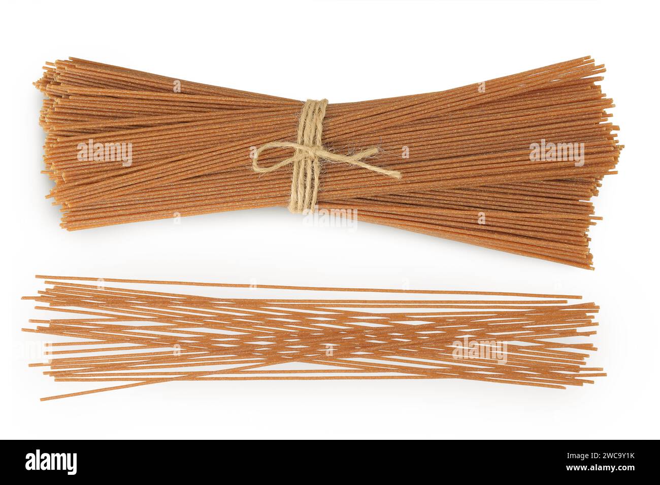 raw wholegrain spaghetti isolated on a white background. Top view. Flat ...