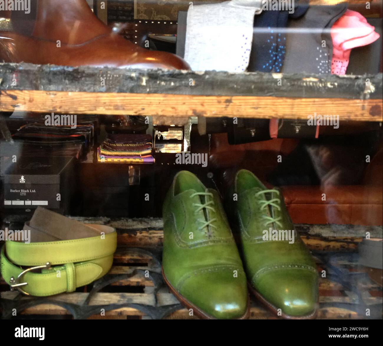 Mens Green Shoes in store window Stock Photo - Alamy