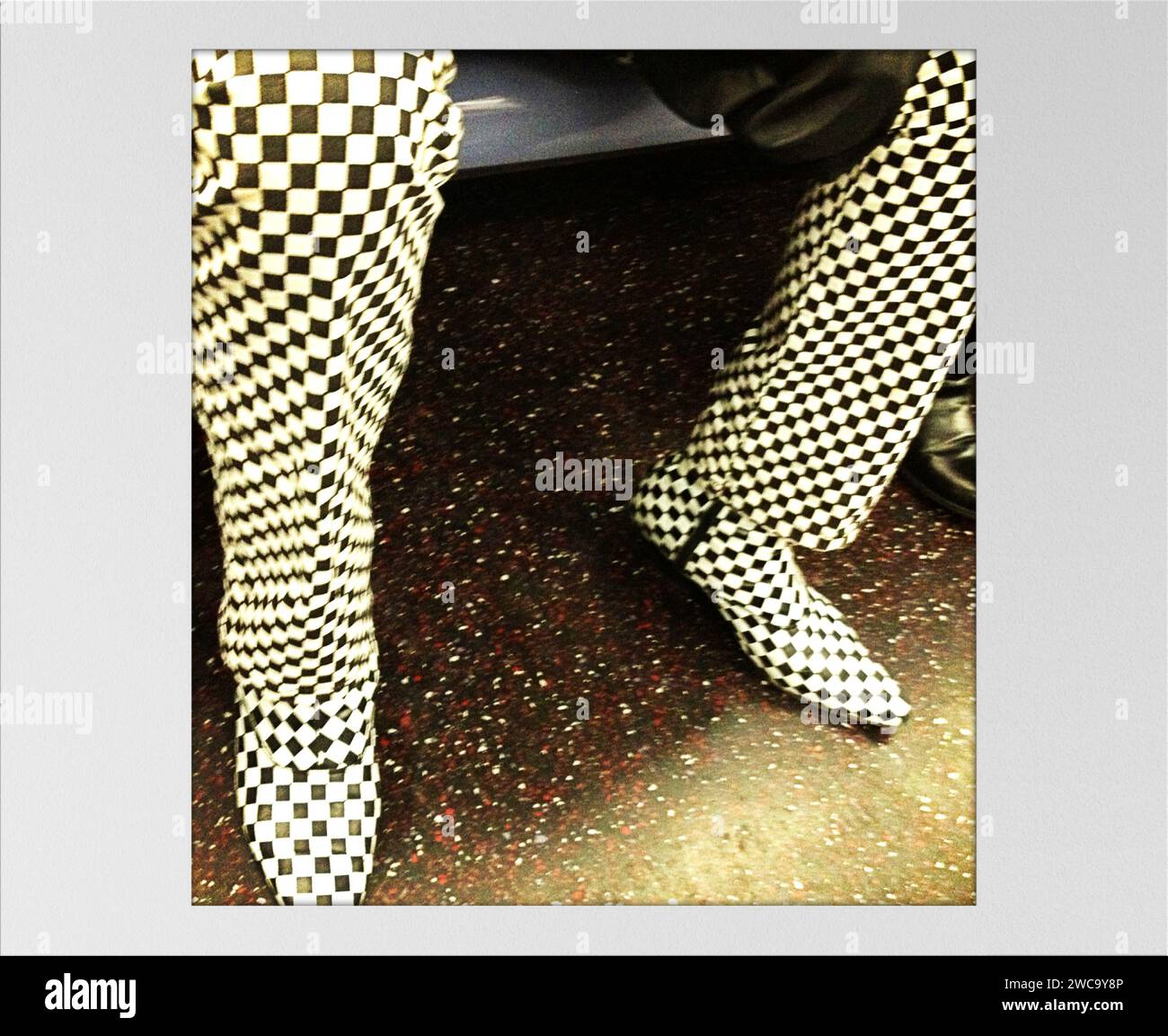 Checked boots hi-res stock photography and images - Alamy