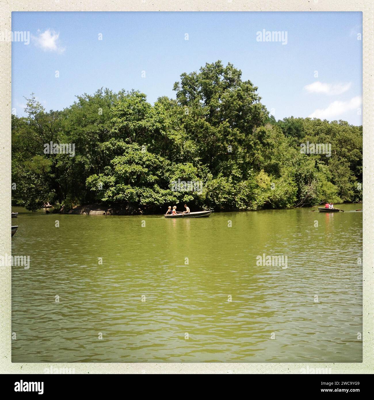 Row Boats on Lake Stock Photo - Alamy