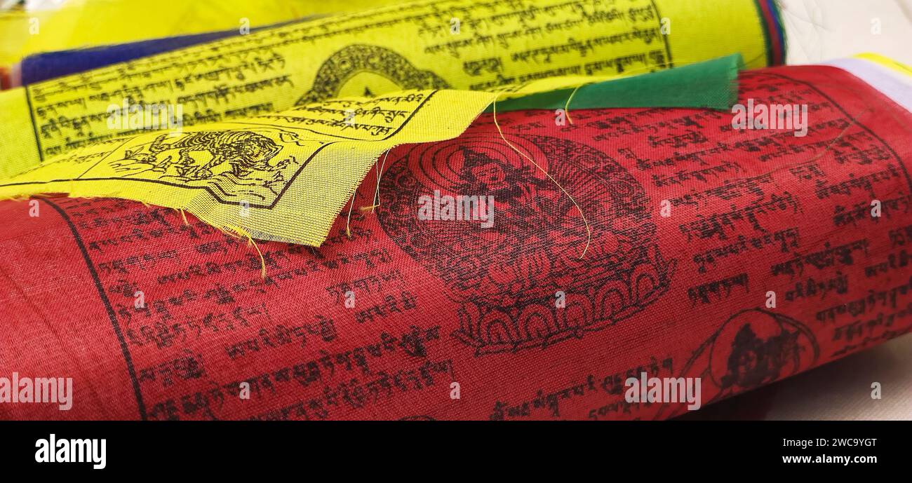 Folded tibetan prayer flags. Long format Stock Photo - Alamy