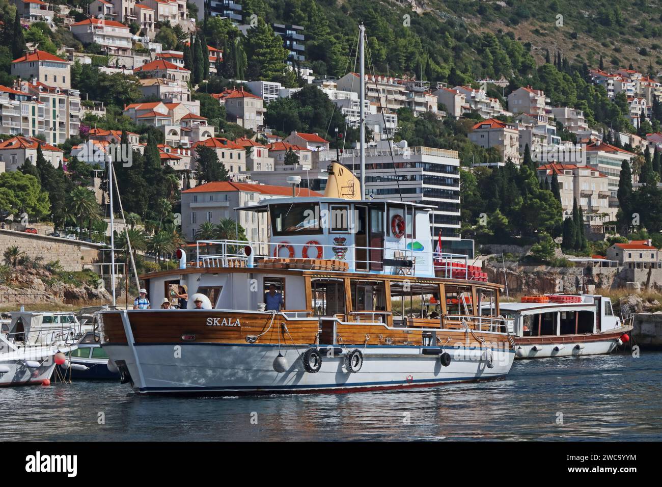 Tourist island ferry boat Skala in Old Port, Dubrovnik Stock Photo - Alamy