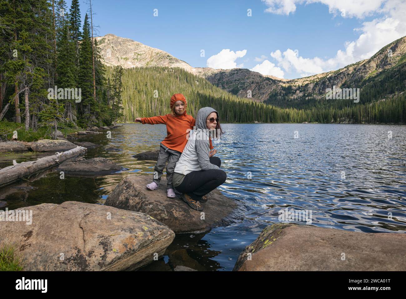 Mother and child enjoying a lakeside adventure together Stock Photo - Alamy