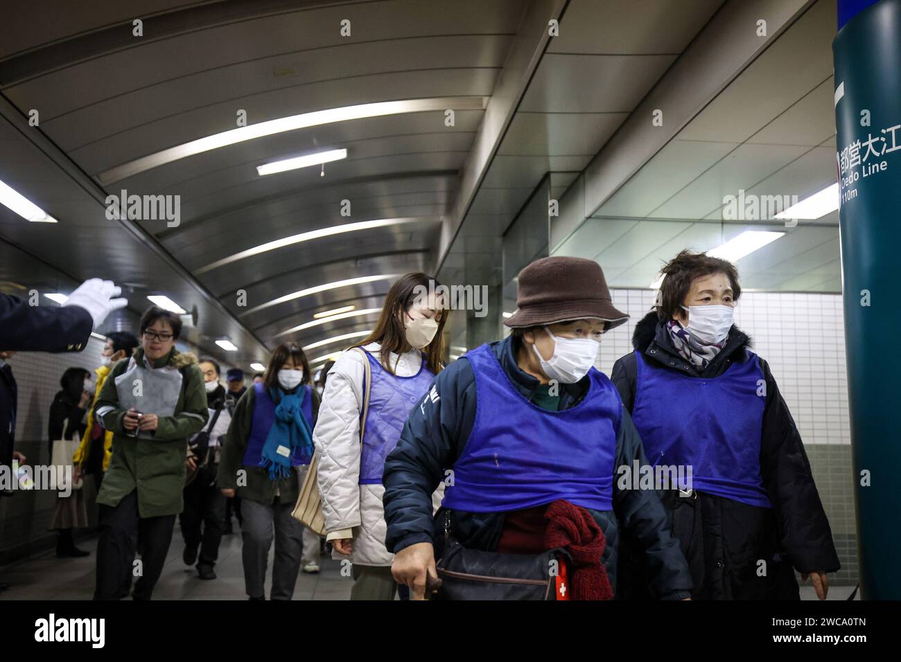 Tokyo, Japan. 15th Jan, 2024. Residents are seen moving through the ...