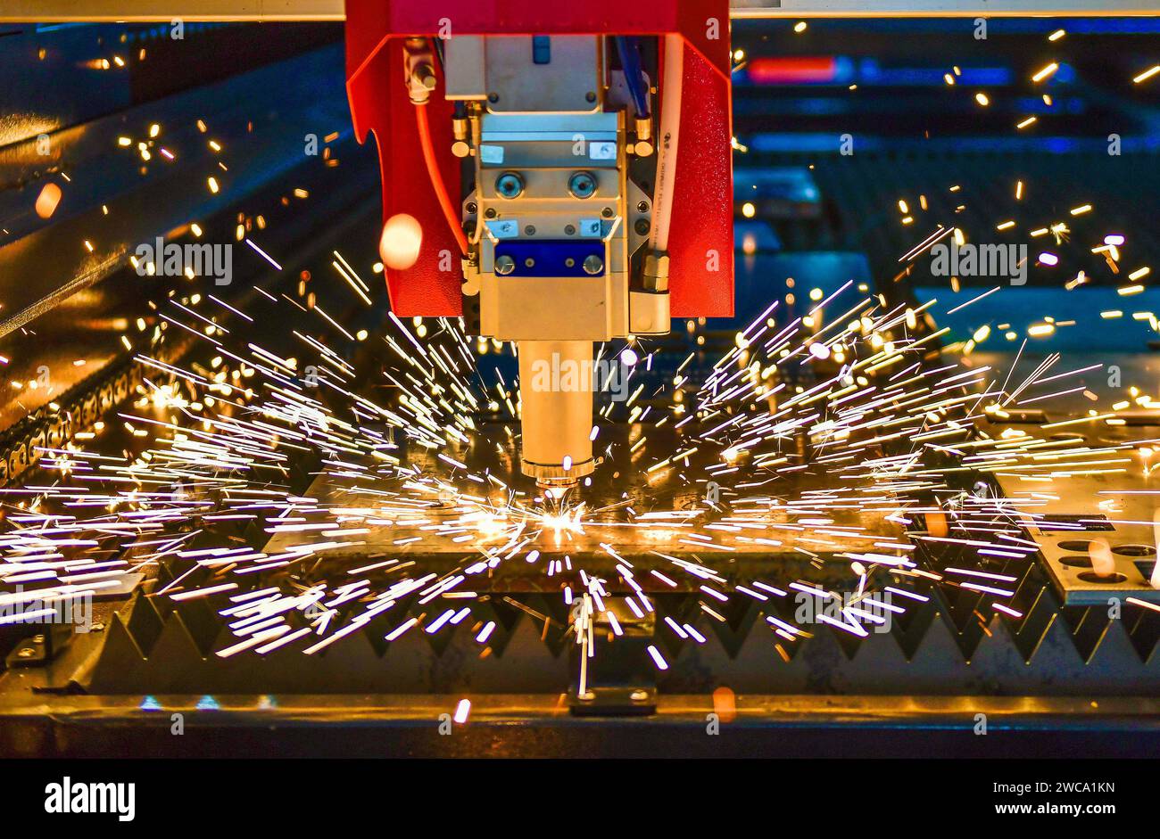 Industrial laser cut machine while cutting the sheet metal with the ...