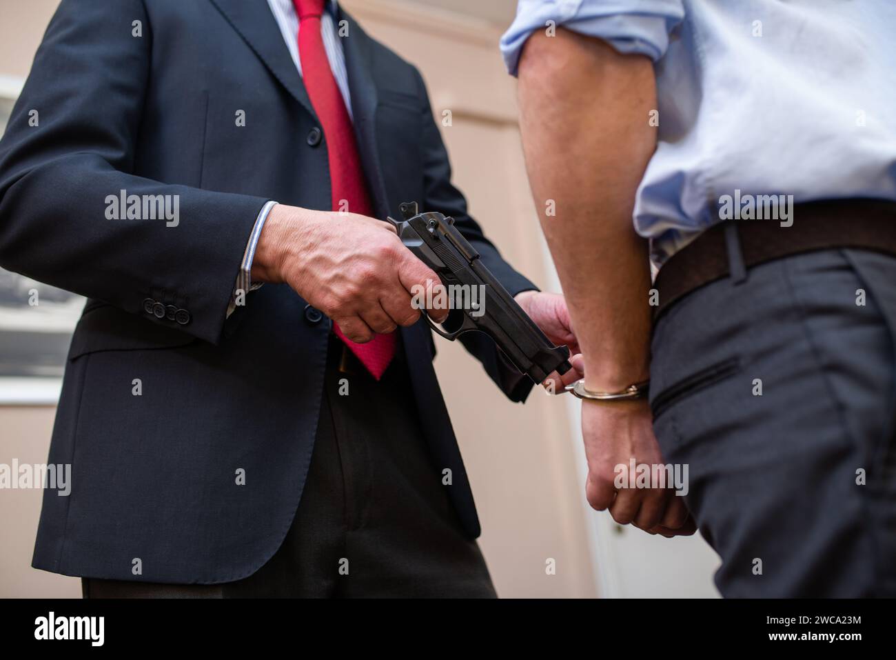 Police arresting gun hi-res stock photography and images - Alamy