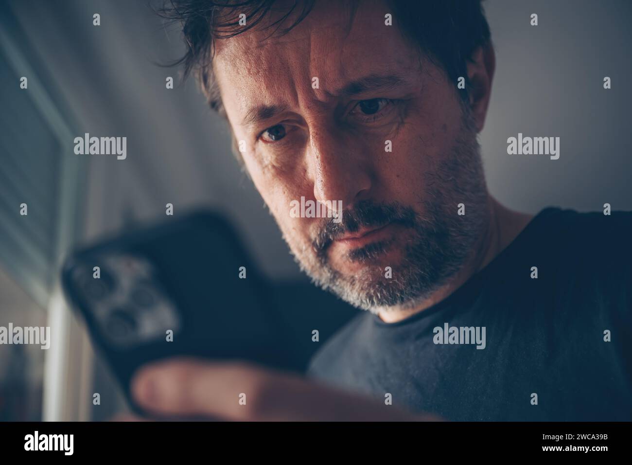 Fraud spam man phone hi-res stock photography and images - Alamy